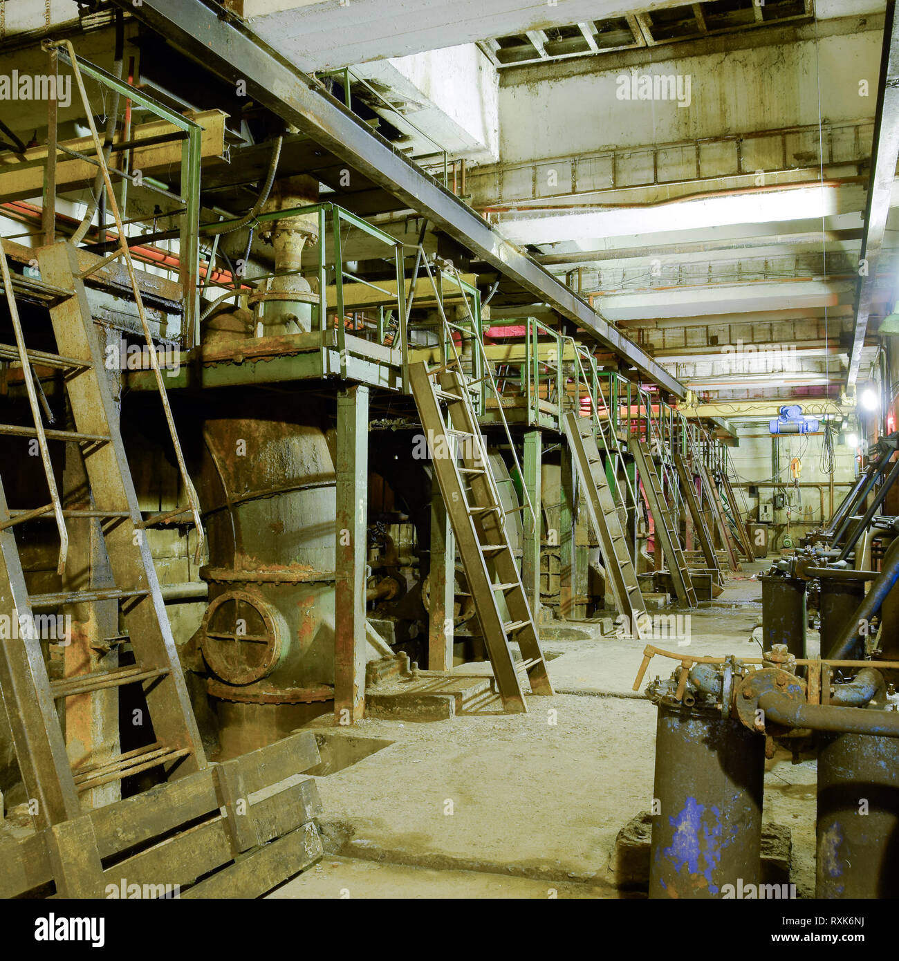 Basement of a water pumping station. Abandoned post-apocalyptic view of ...