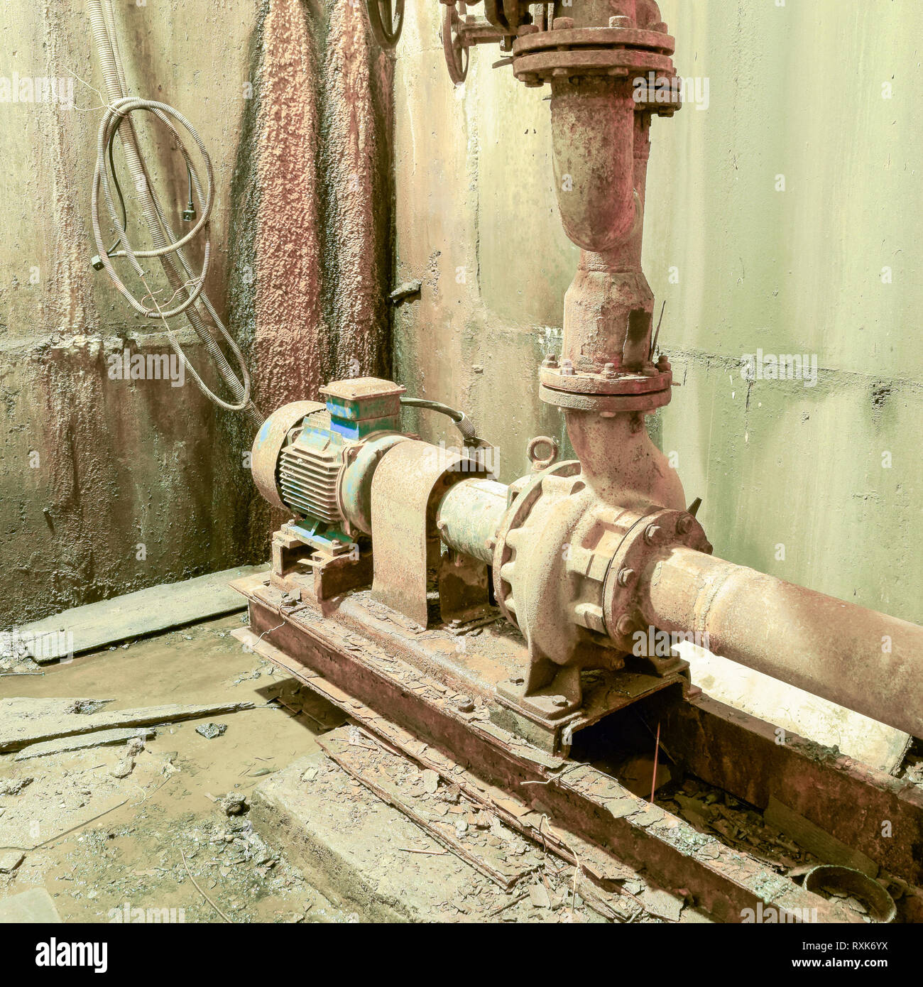 Basement of a water pumping station. Abandoned post-apocalyptic view of ...