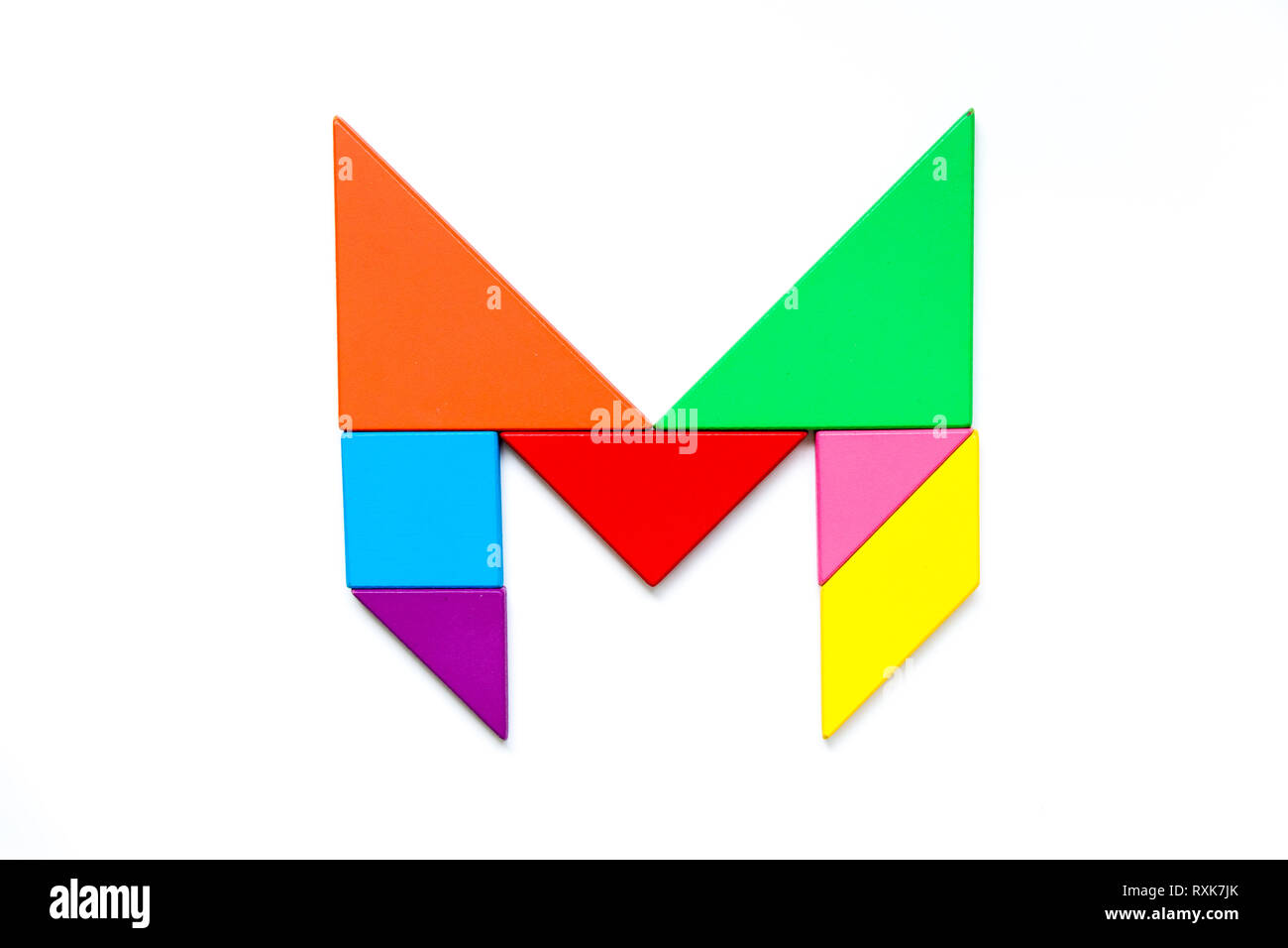 Color tangram puzzle in english alphabet m shape on white background ...