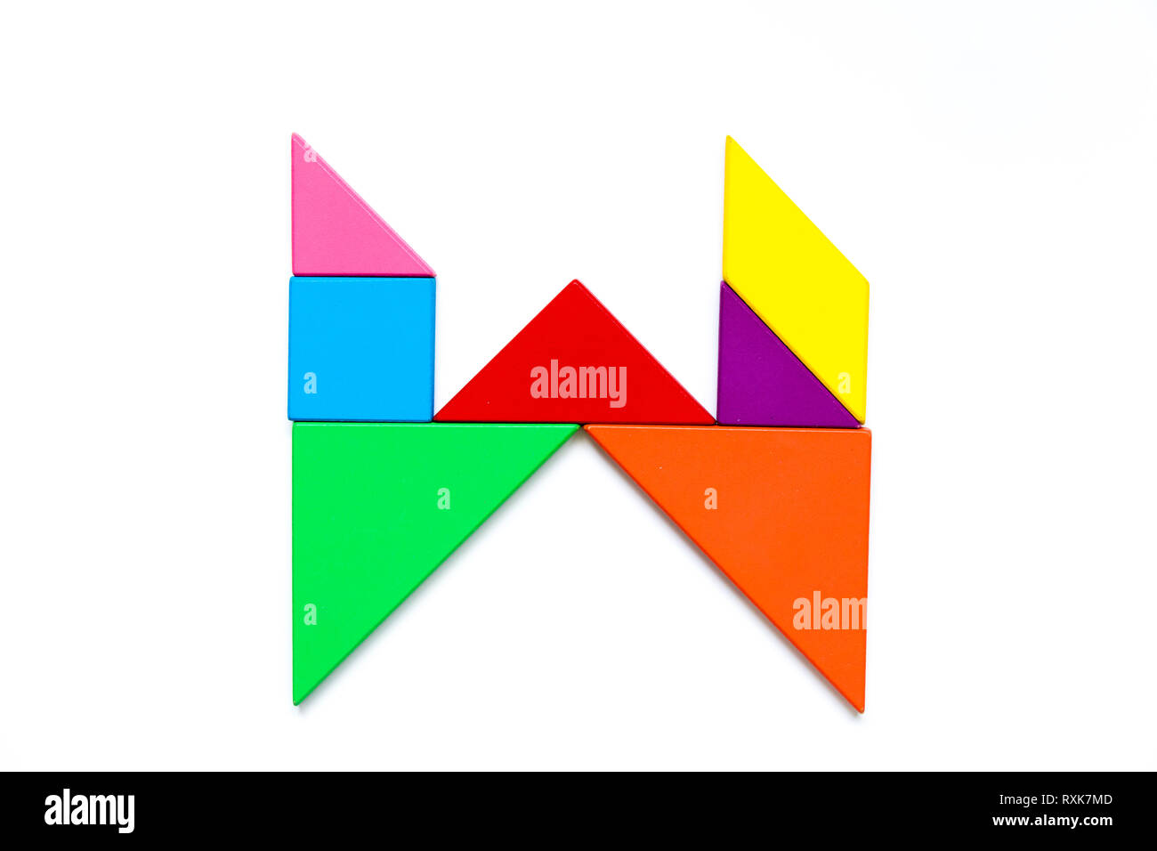 Color tangram puzzle in english alphabet w shape on white background ...