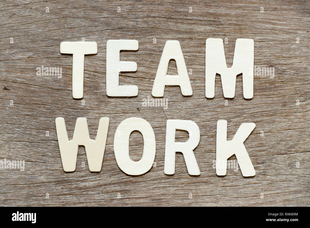Alphabet letter in word teamwork on wood background Stock Photo - Alamy