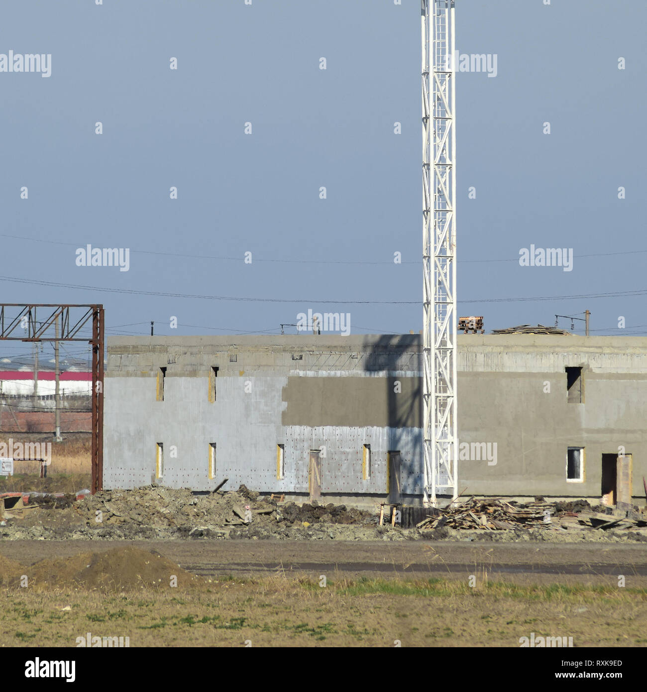 Building under construction. The construction of auxiliary buildings at ...