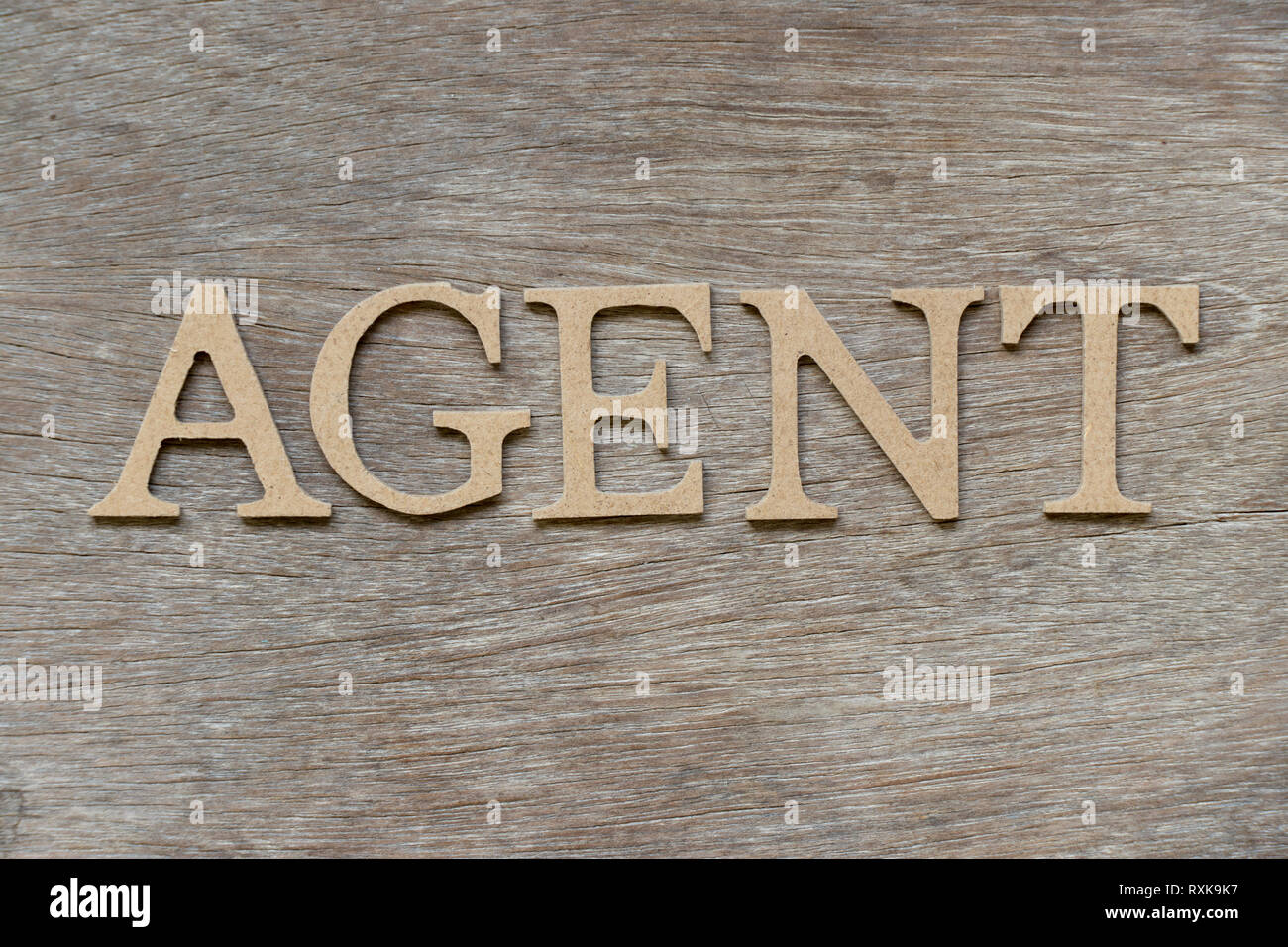 Alphabet letter in word agent on wood background Stock Photo - Alamy