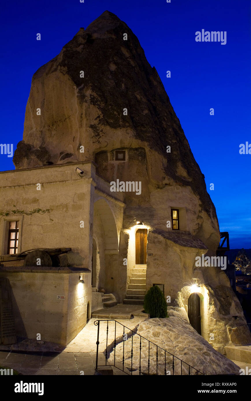A fairy chimney with cave rooms at Cappadocia Cave Suites in Göreme, in ...