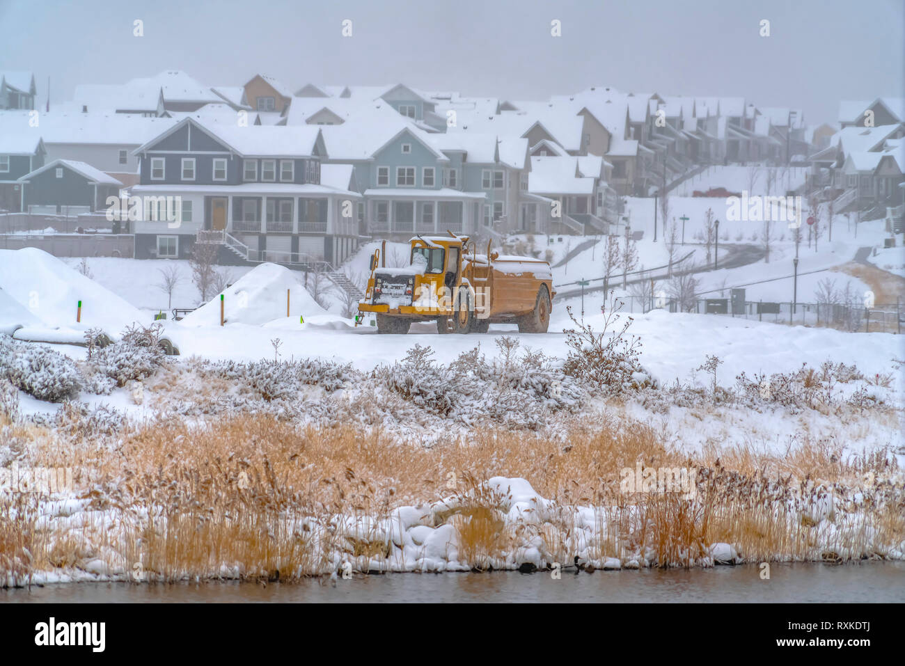 Truck on the snowy lake shore in Daybreak Utah Stock Photo - Alamy