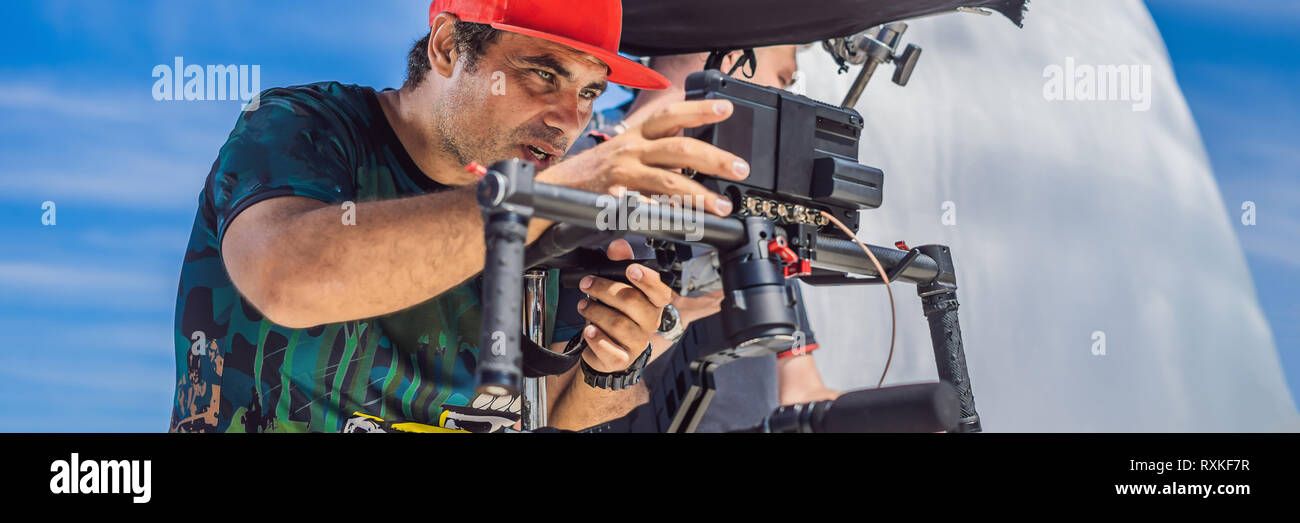 the production team on a commercial video shoot. Steadicam operator ...