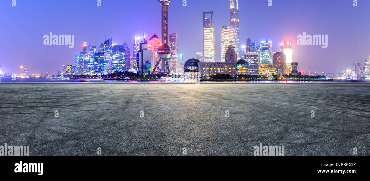 Empty asphalt square ground with panoramic city skyline in Shanghai ...