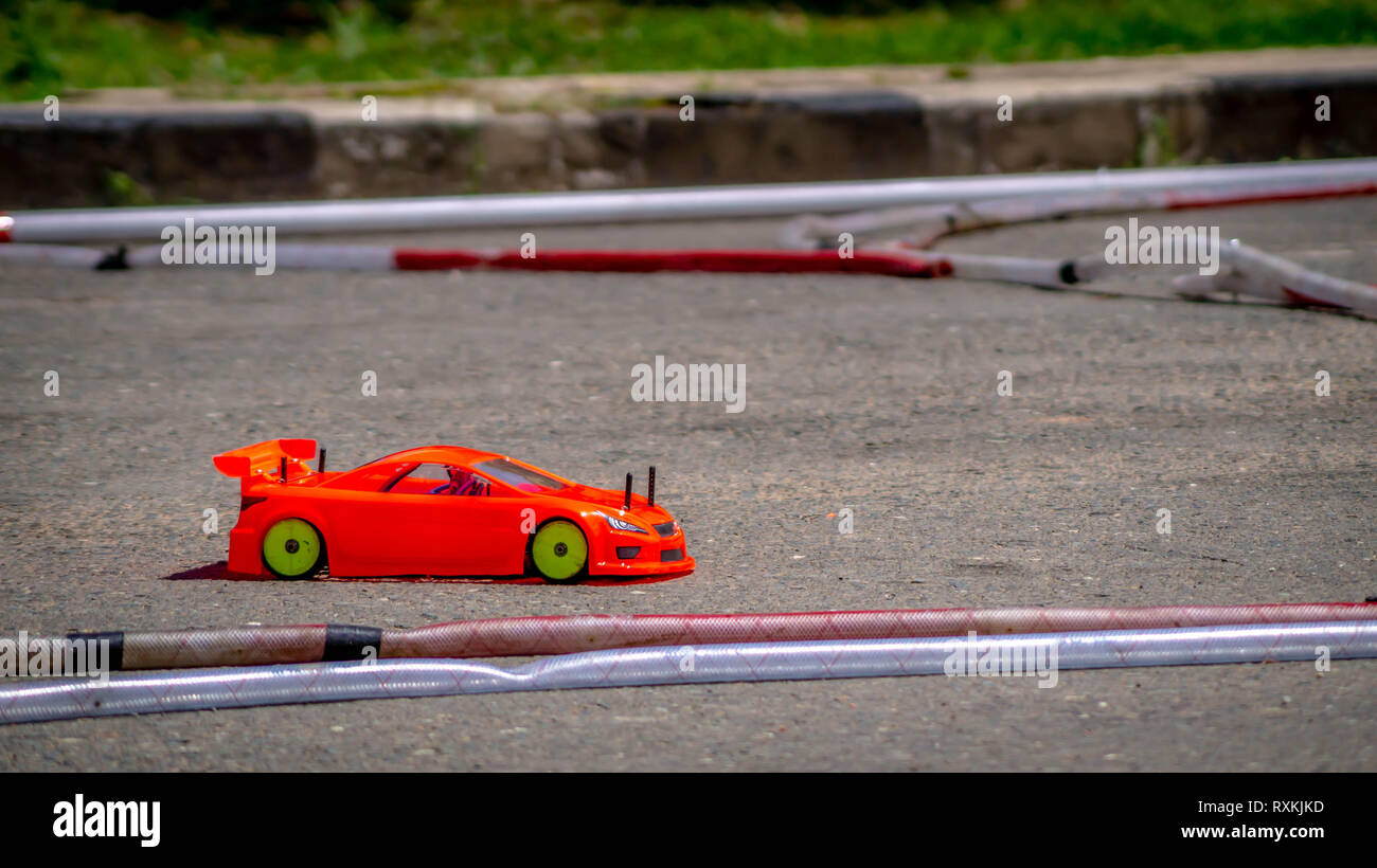 remote control car race competition on tarmac circuit Stock Photo - Alamy