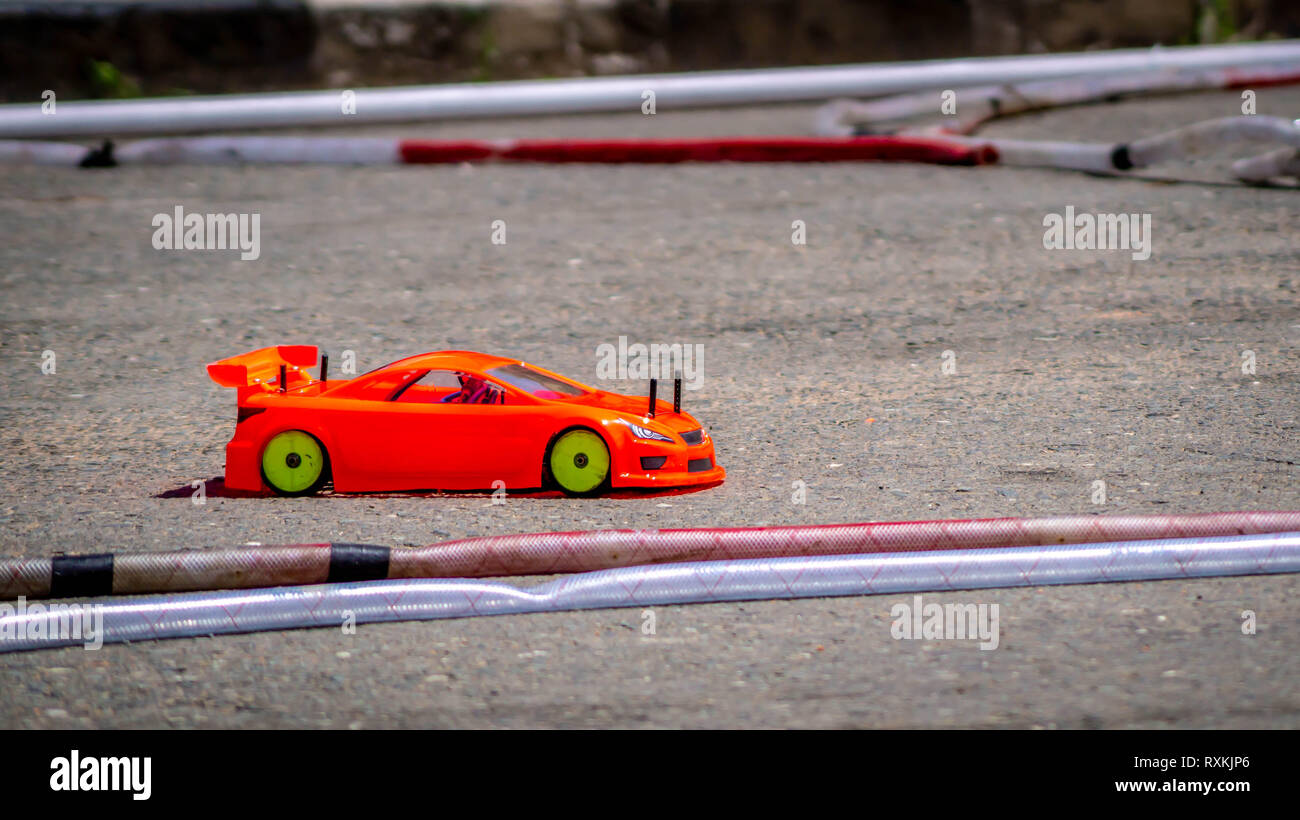 remote control car race competition on tarmac circuit Stock Photo - Alamy