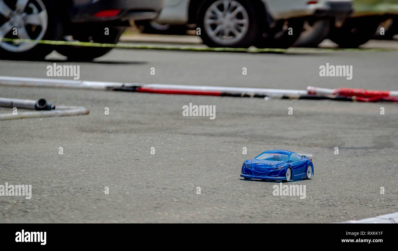 remote control car race competition on tarmac circuit Stock Photo - Alamy