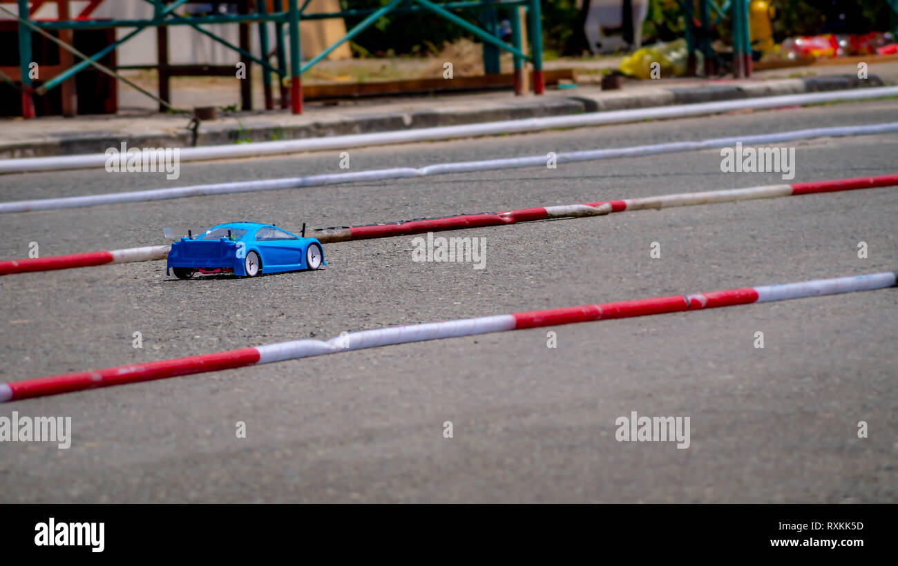 remote control car race competition on tarmac circuit Stock Photo - Alamy