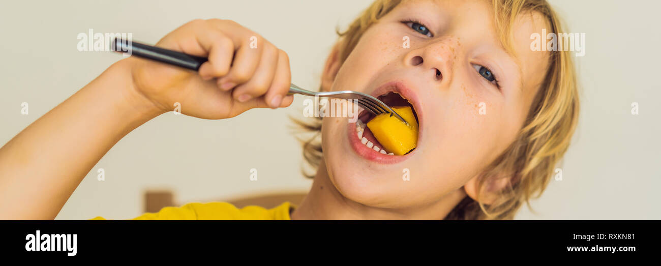 Boy eats fruit. Healthy food for children. Child eating healthy snack ...