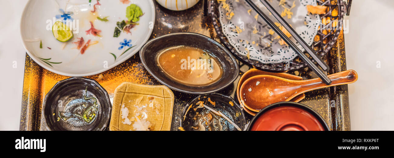Messy table after meal in Japanese restaurant. Dirty, finish meal ...