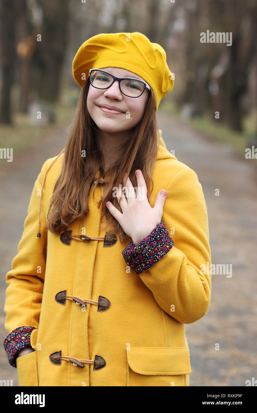 Girl in a yellow beret hi-res stock photography and images - Alamy