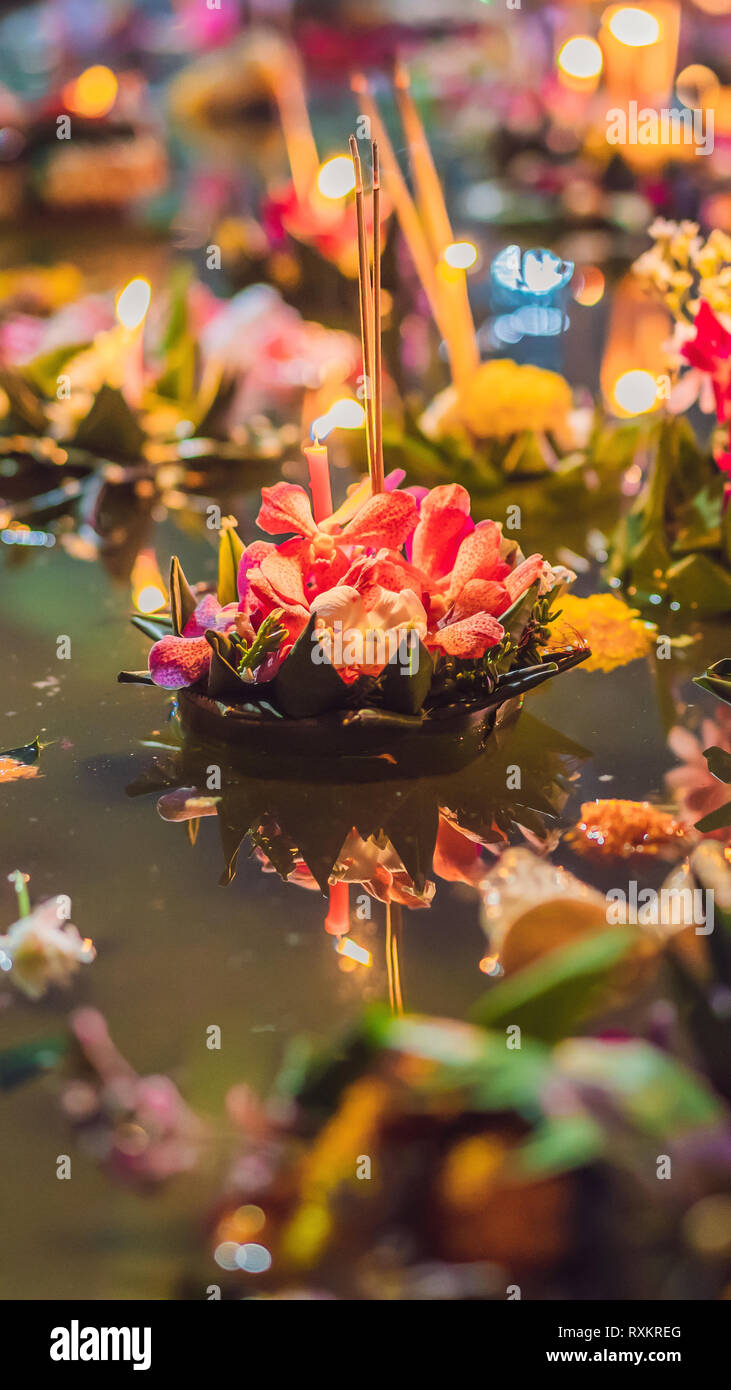 Loy Krathong festival, People buy flowers and candle to light and float ...