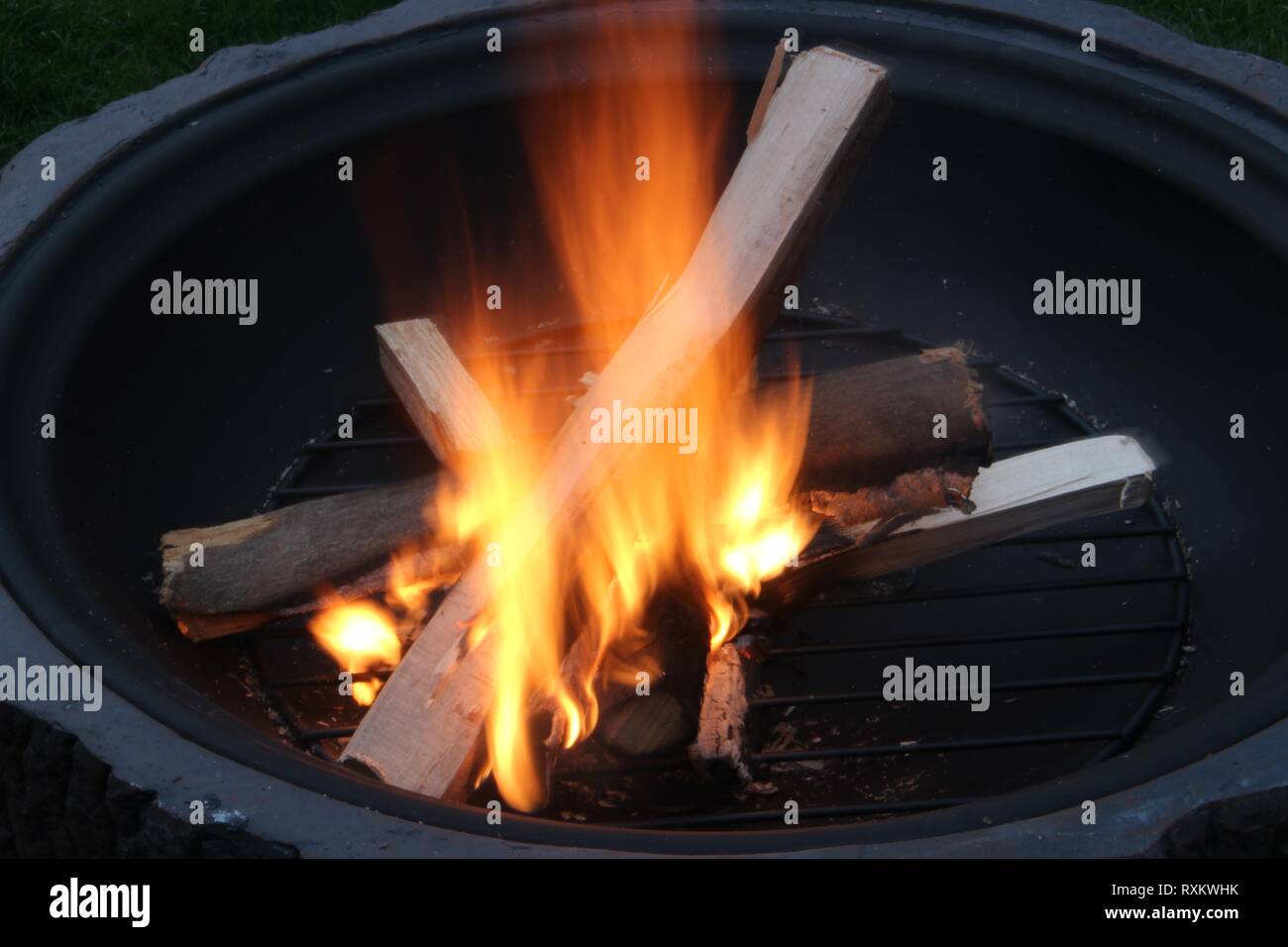 Burning wood with long exposure fire Stock Photo - Alamy