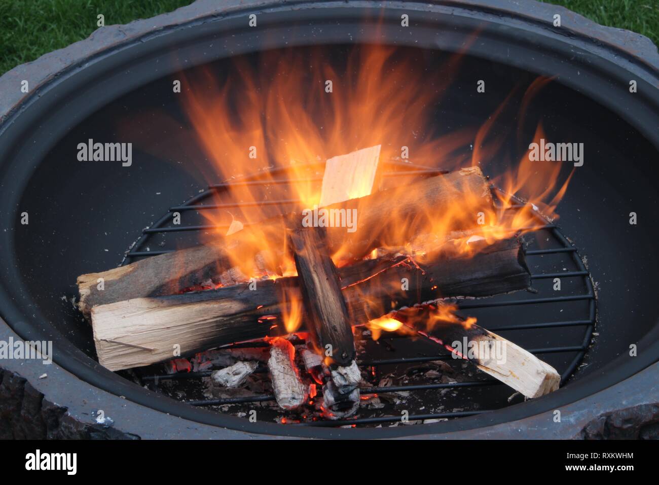 Burning wood with long exposure fire Stock Photo - Alamy