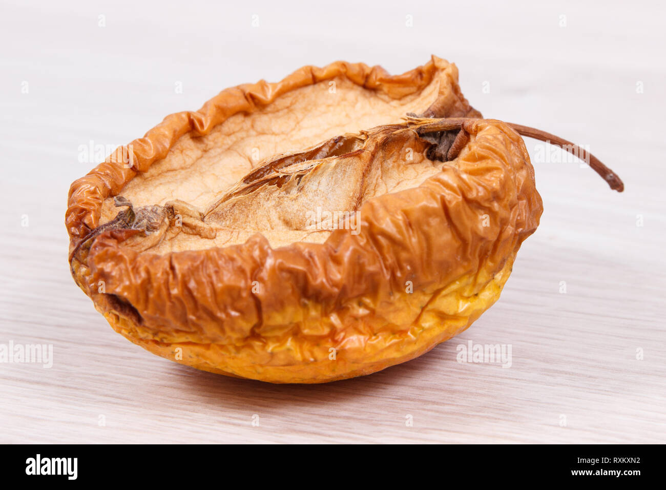 Spoiled wrinkled apple with mold, concept of unhealthy and disgusting ...