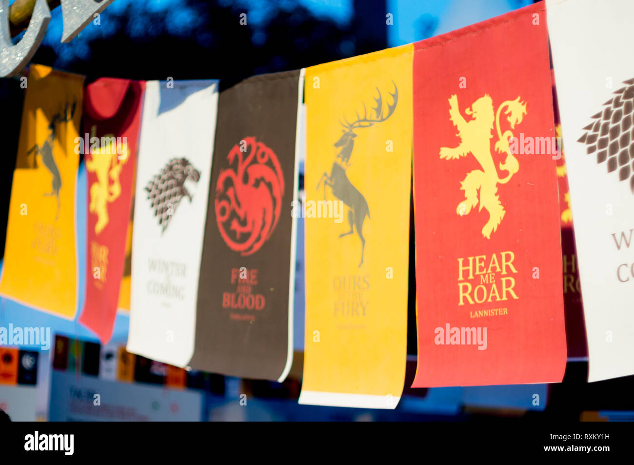 Multicolored game of throne flags made by fans and hung Stock Photo - Alamy