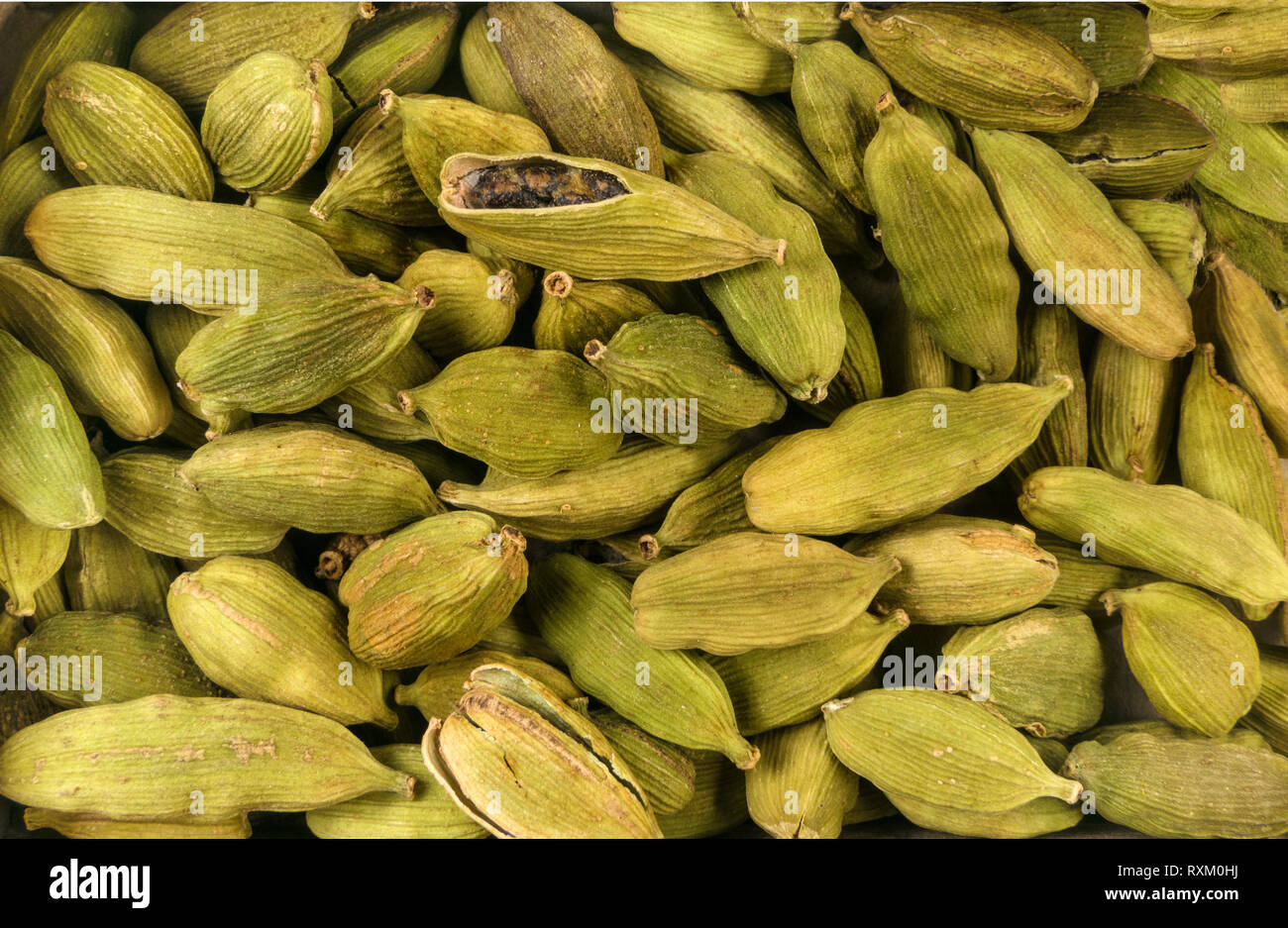 cardamon seeds background. Natural seasoning texture. Natural spices ...