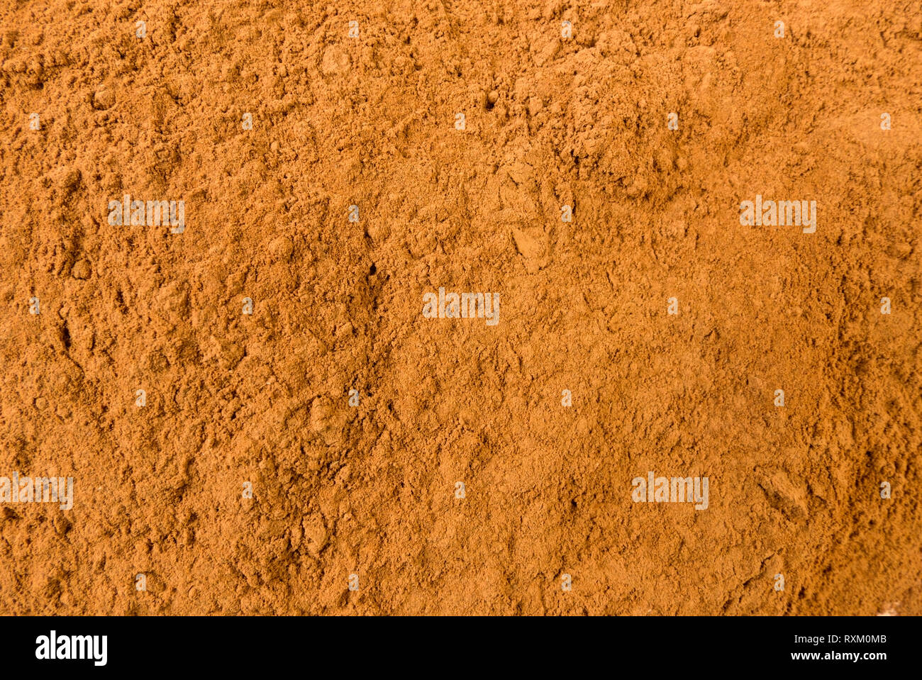 ground or milled cinnamon background. Natural seasoning texture ...