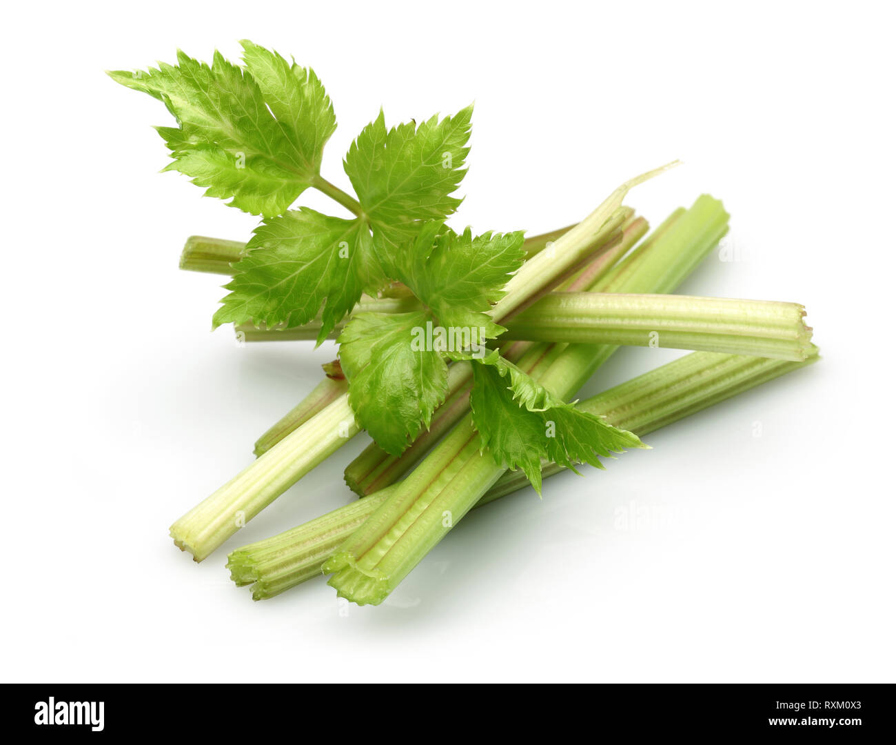 Fresh celery stalks and leaves isolated on white background Stock Photo ...