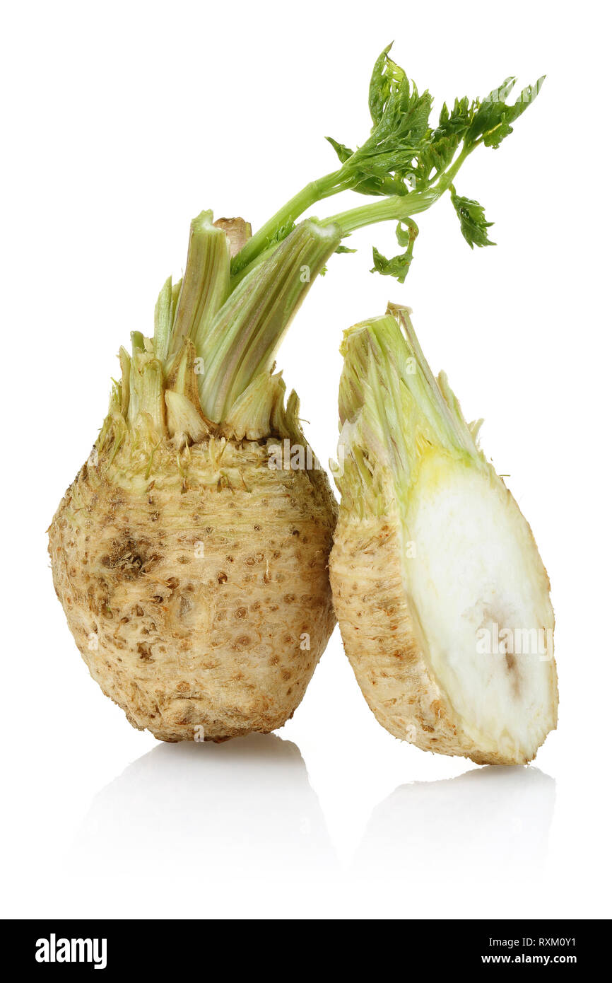 Fresh celeriac root with celery stalks and slice isolated on white ...