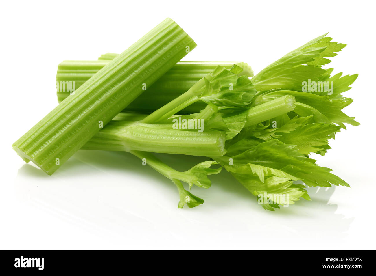 Fresh celery stalks and leaves isolated on white background Stock Photo ...