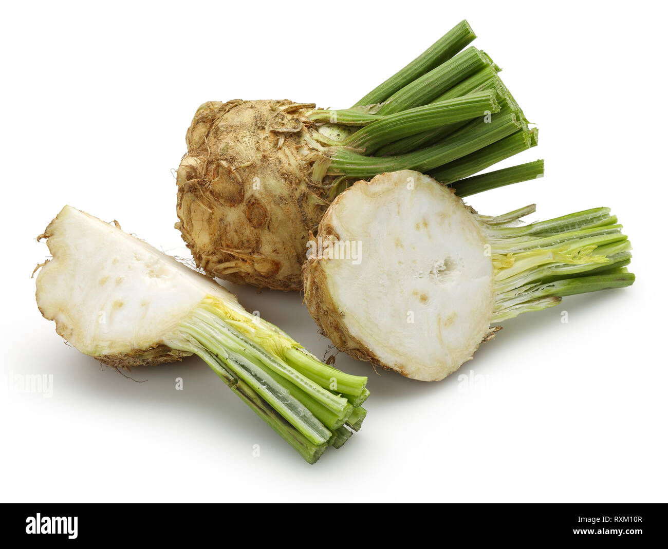 Fresh celeriac root with celery stalks and slice isolated on white ...