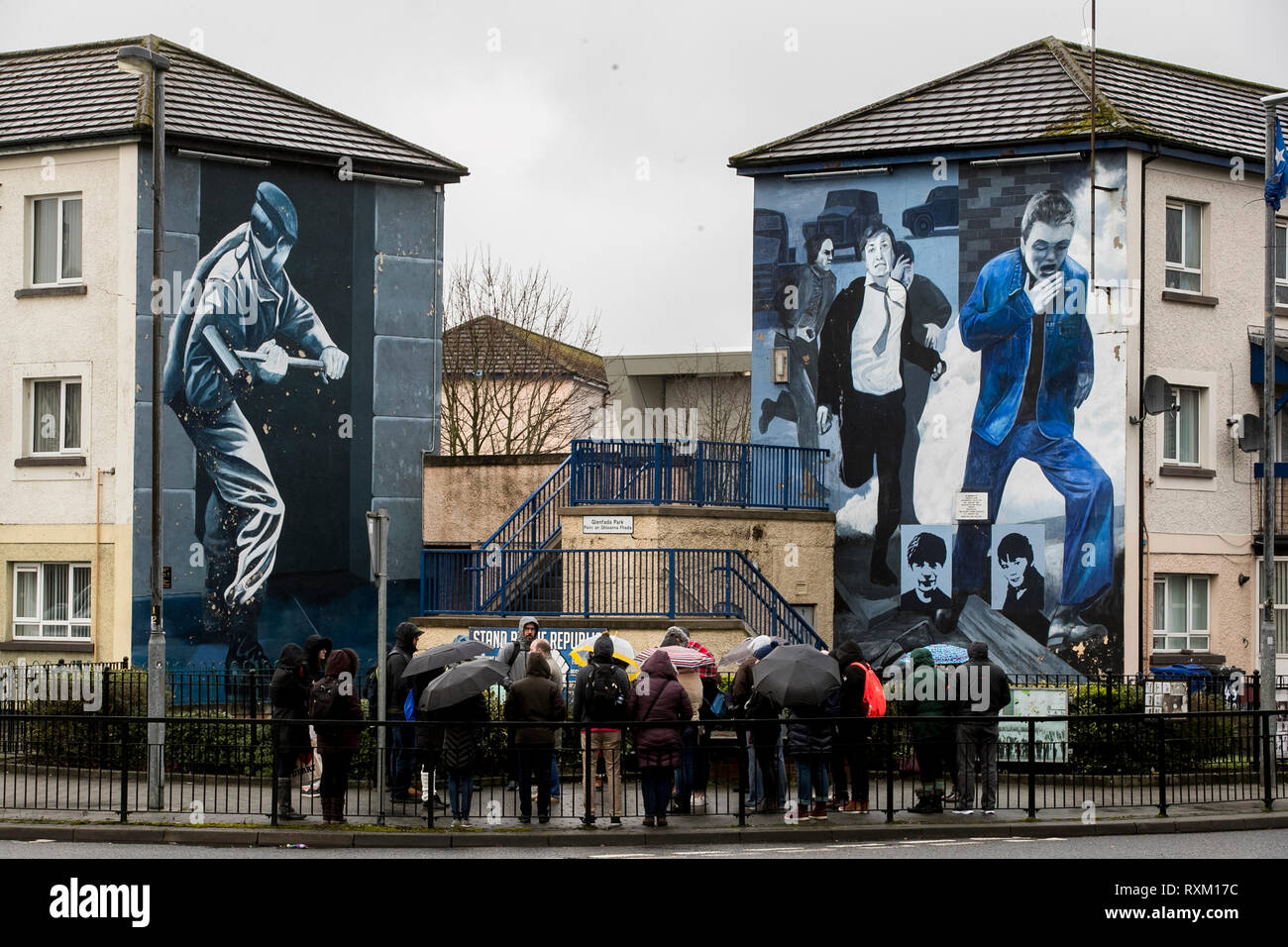 Tourists are shown Derry's Bogside murals, Operation Motorman: The ...