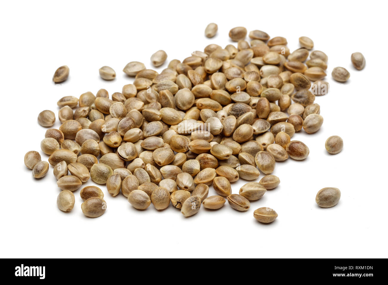 Heap of dry hemp seeds isolated on white background Stock Photo - Alamy