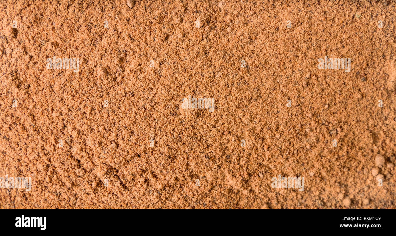 milled or ground nutmeg background. Natural seasoning texture. Natural ...