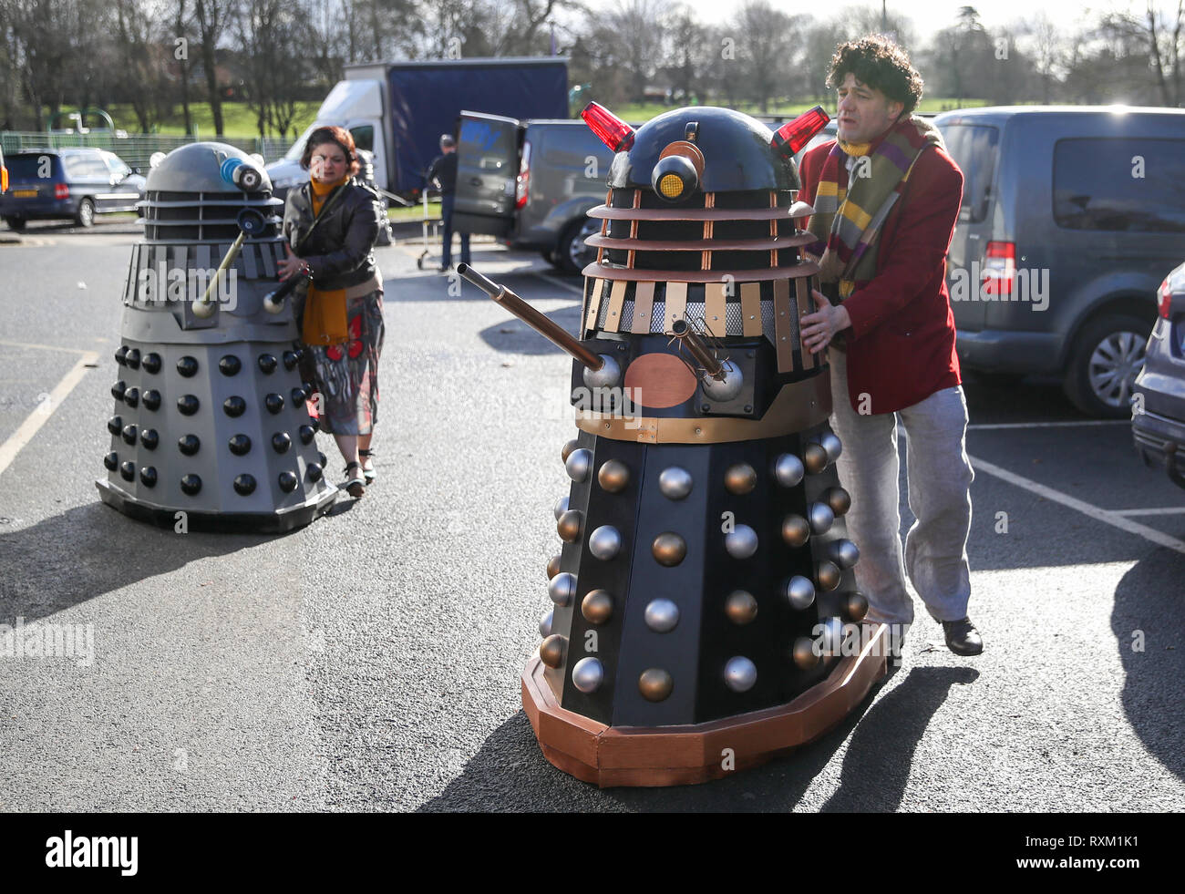 People push their Daleks as they arrive for a world record attempt for ...