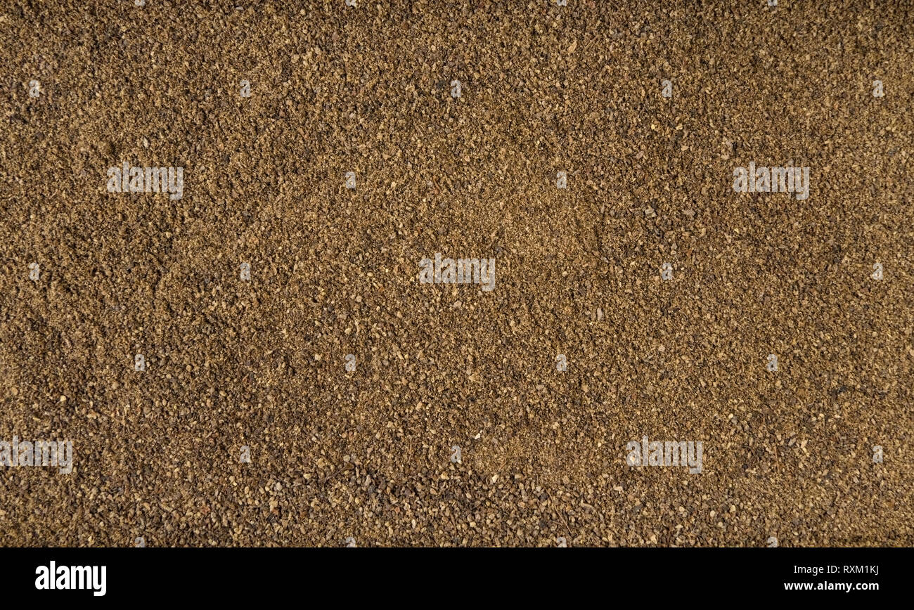 milled or ground black pepper background. Natural seasoning texture ...