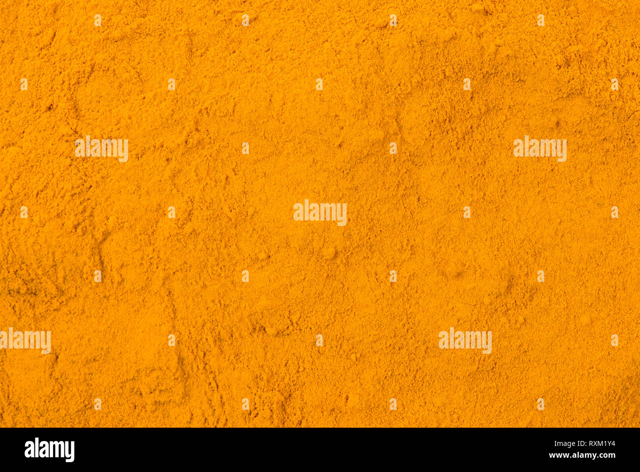 turmeric powder background. Natural seasoning texture. Natural spices ...