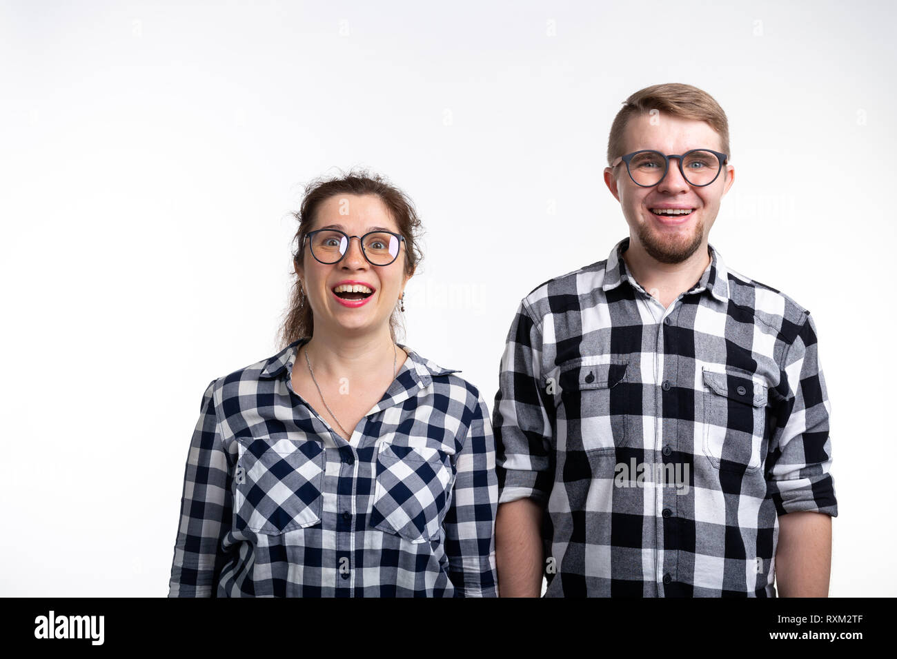 Nerds, bespectacled and funny people concept - funny couple in glasses ...