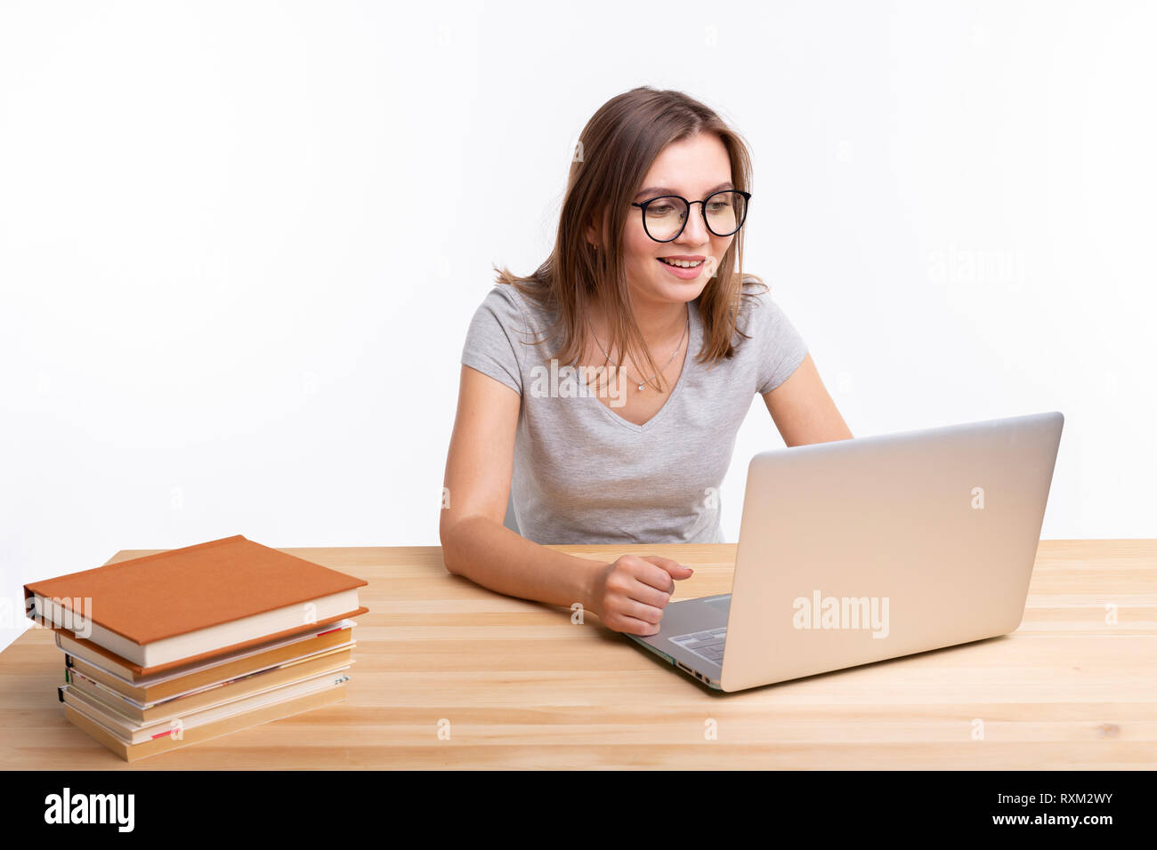 Study, education and people concept - young woman nerd is learning ...