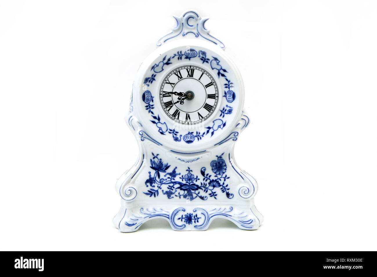 The blue onion china clock. Vintage ornamental piece of art Stock Photo ...