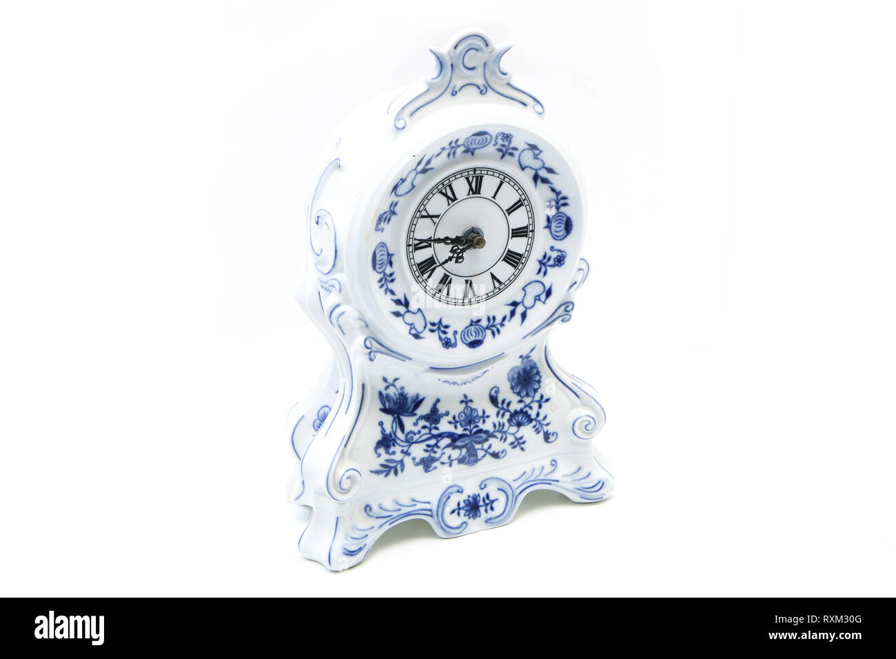 The blue onion china clock. Vintage ornamental piece of art Stock Photo ...