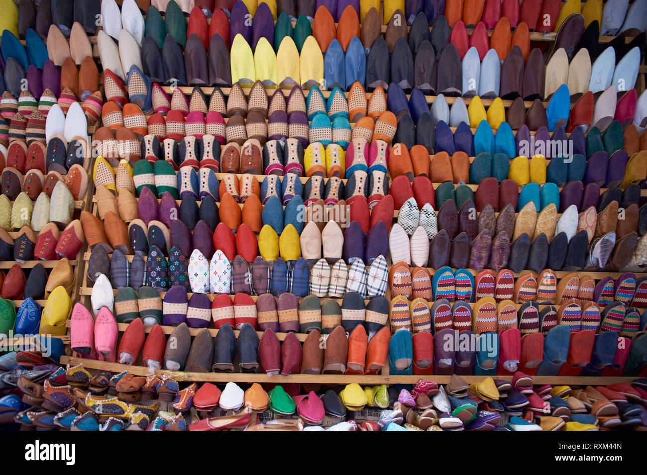 Colorful display of traditional leather slippers for sale in the souk ...