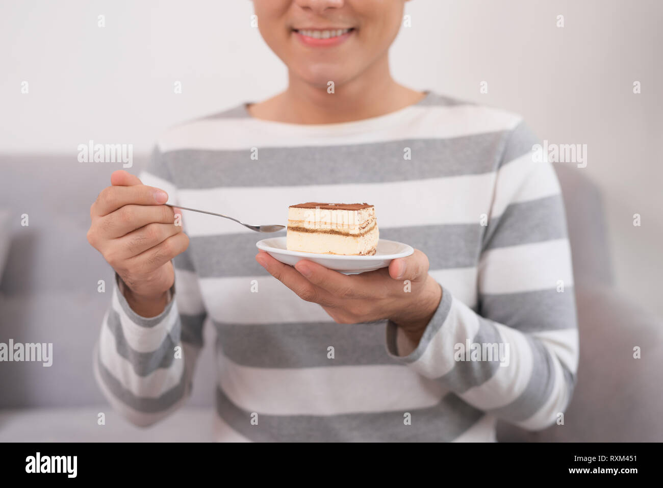 Man eating cake hi-res stock photography and images - Alamy