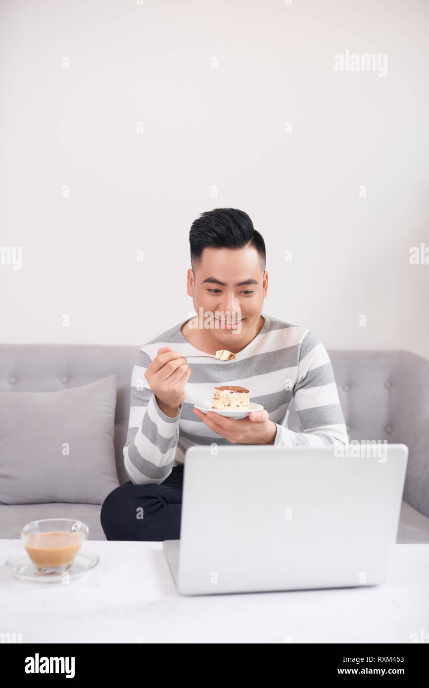 Asian Man Eating Sofa High Resolution Stock Photography and Images - Alamy