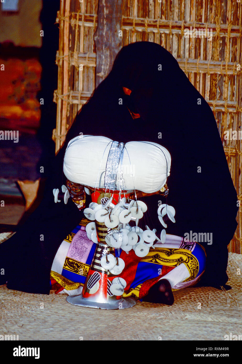 Arab folklore and history with Emirati Bedouin women demonstrating the ...