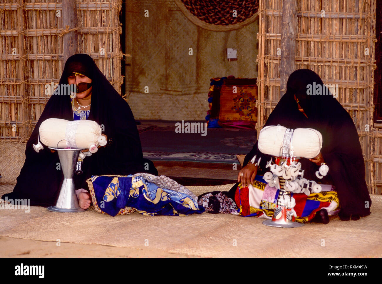 Arab folklore and history with Emirati Bedouin women demonstrating the ...