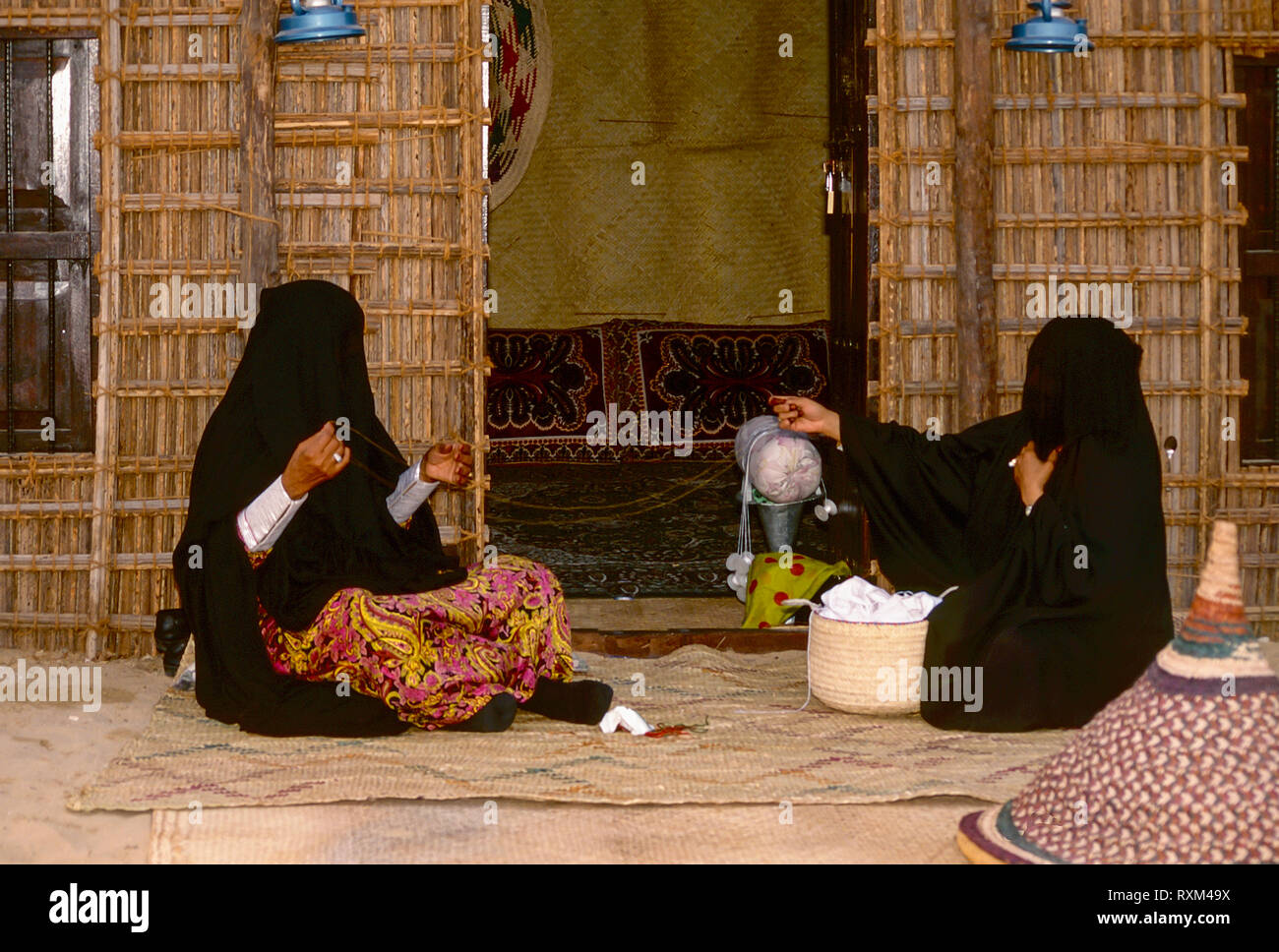 Arab folklore and history with Emirati Bedouin women demonstrating the ...