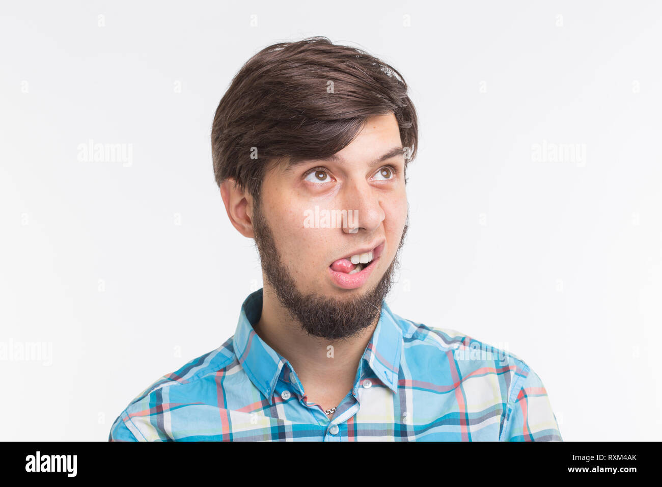 Expression, april fools day and joke concept - Young funny bearded man ...
