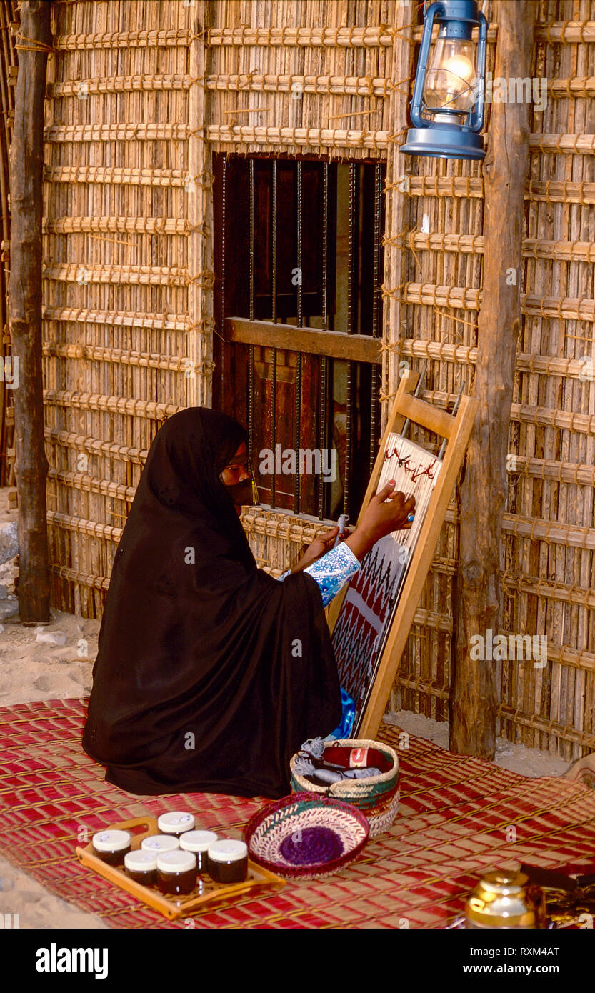Arab folklore and history with an Emirati Bedouin lady demonstrating ...