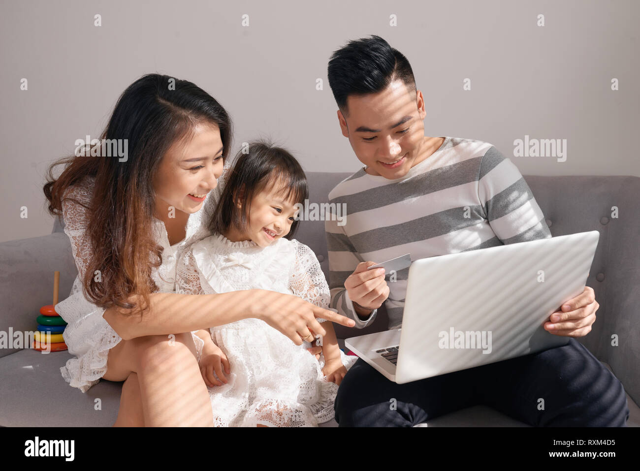 Asian mother child daughter laptop computer hi-res stock photography ...