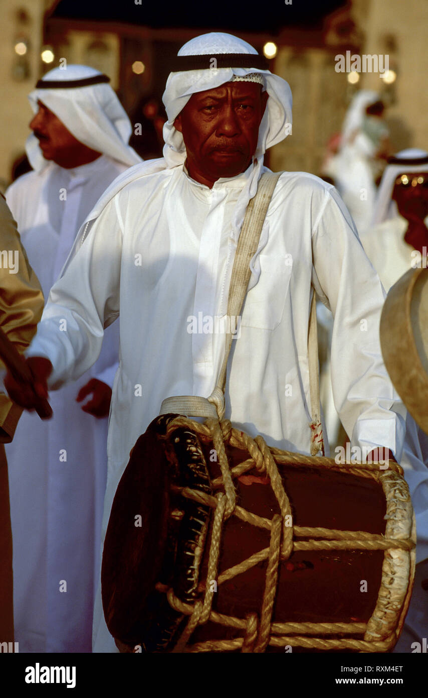 Arab folklore and history with an Emirati band member with his drum ...