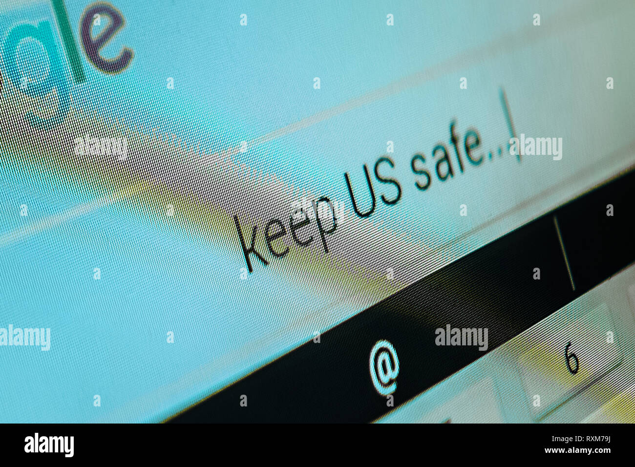 On the computer screen is written: "keep US safe Stock Photo - Alamy